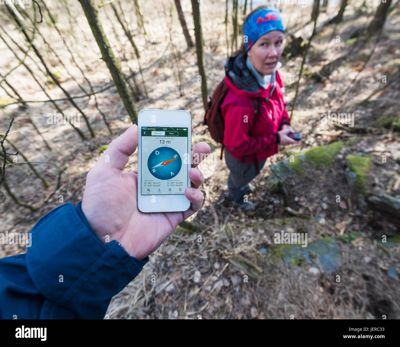 Hand holding compass app hi-res stock photography and images - Alamy
