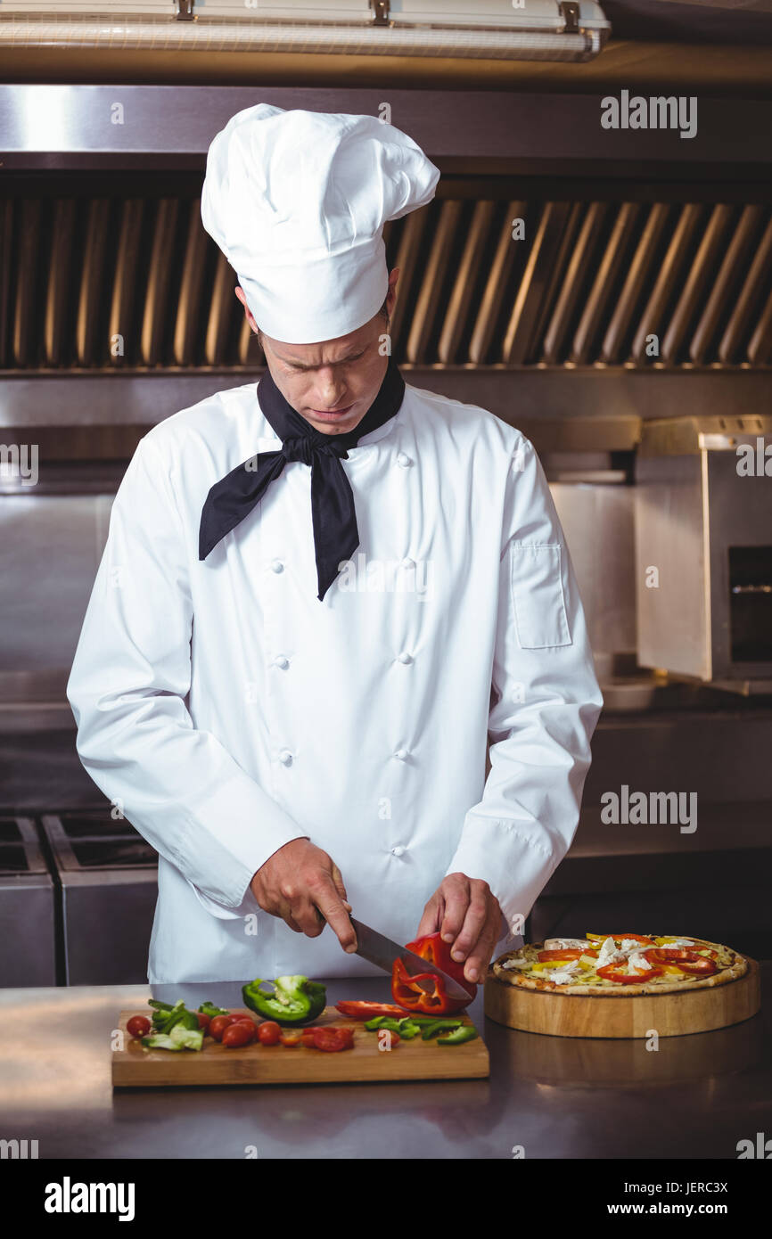 Chef slicing vegetables Stock Photo - Alamy
