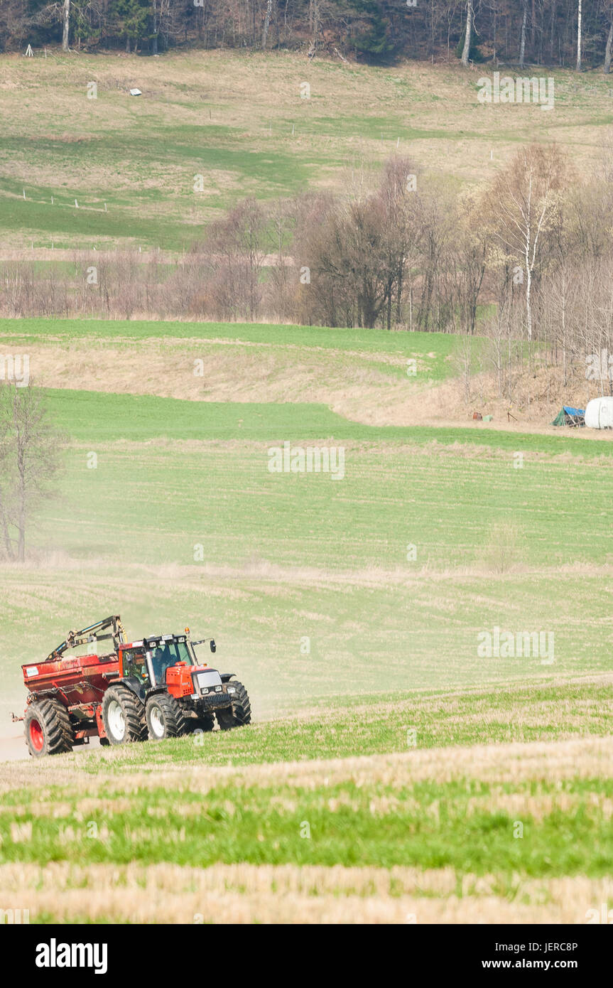 Tractor on field Stock Photo - Alamy