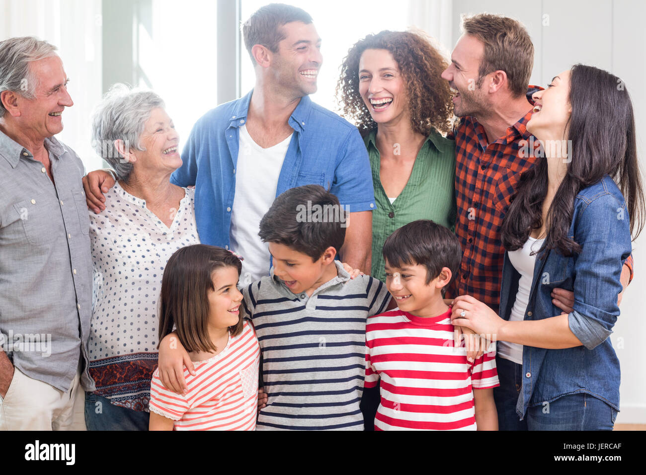 Happy family together at home Stock Photo - Alamy
