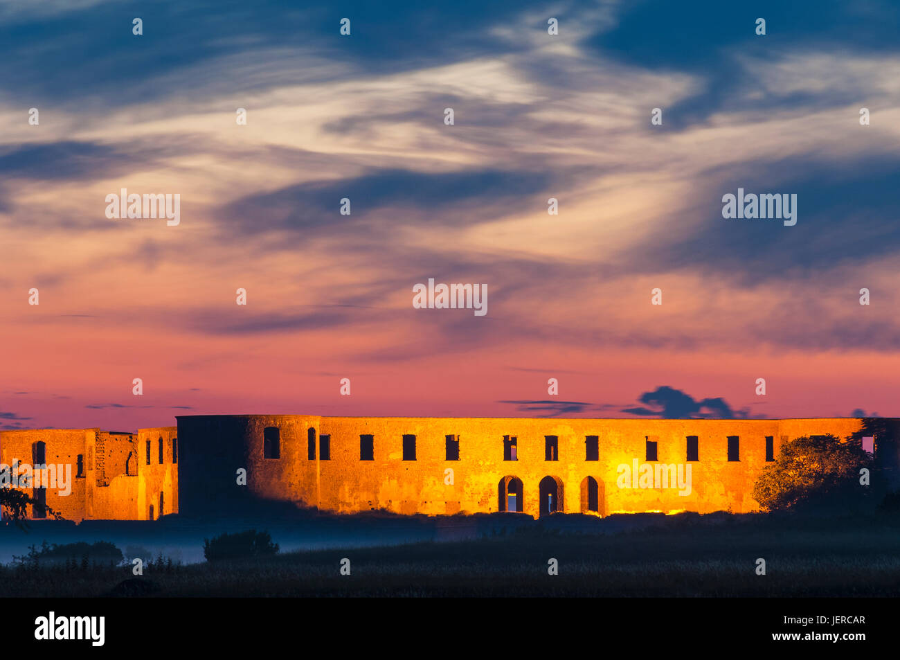 Illuminated fortified building Stock Photo - Alamy