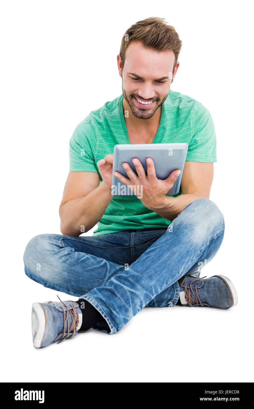 Man using tablet reading Cut Out Stock Images & Pictures - Alamy