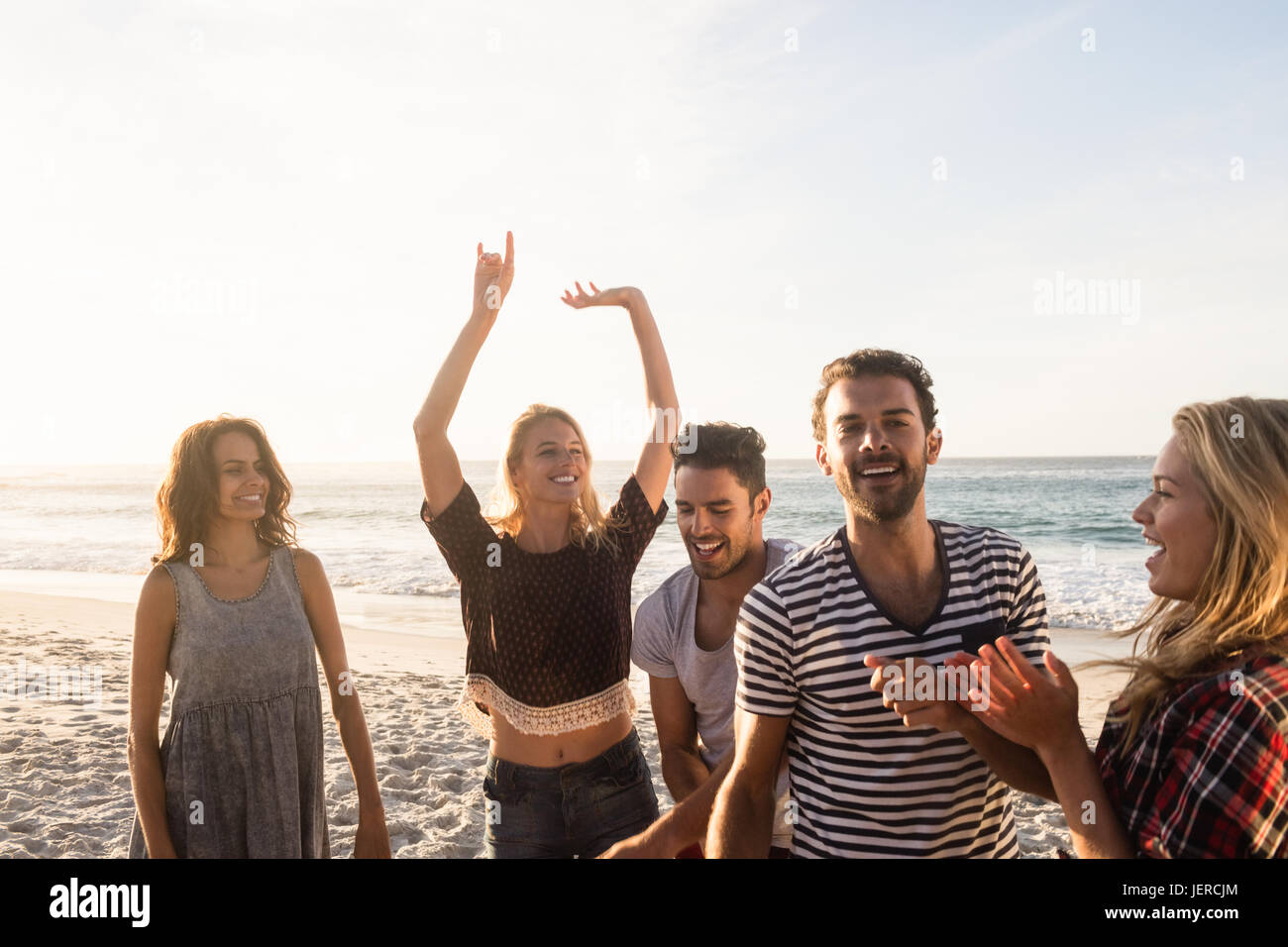 Happy friends dancing hi-res stock photography and images - Alamy