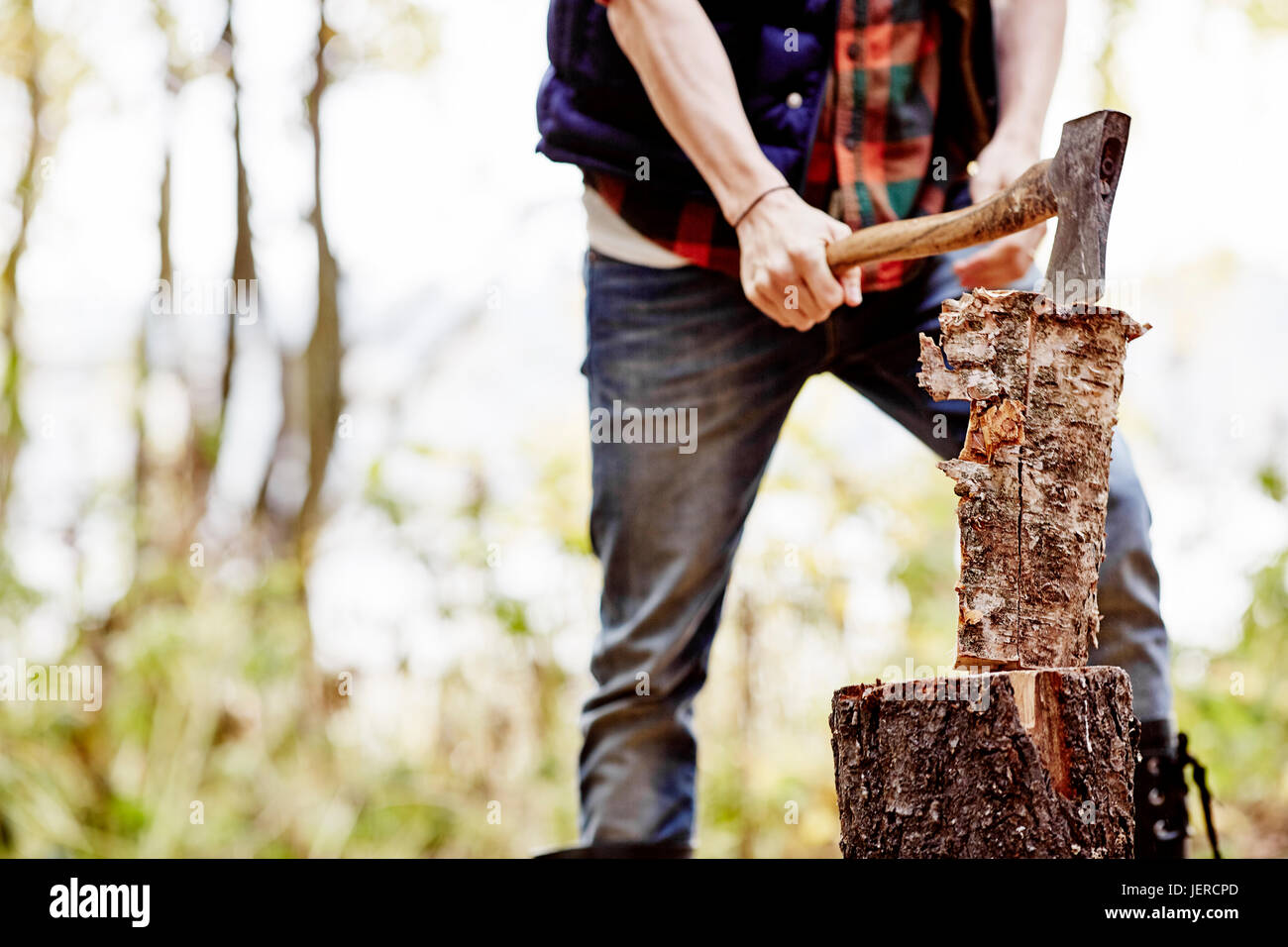 Man chopping wood hi-res stock photography and images - Alamy