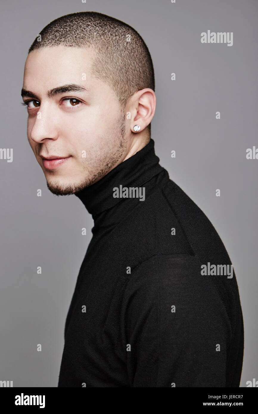 Portrait of young man, studio shot Stock Photo - Alamy