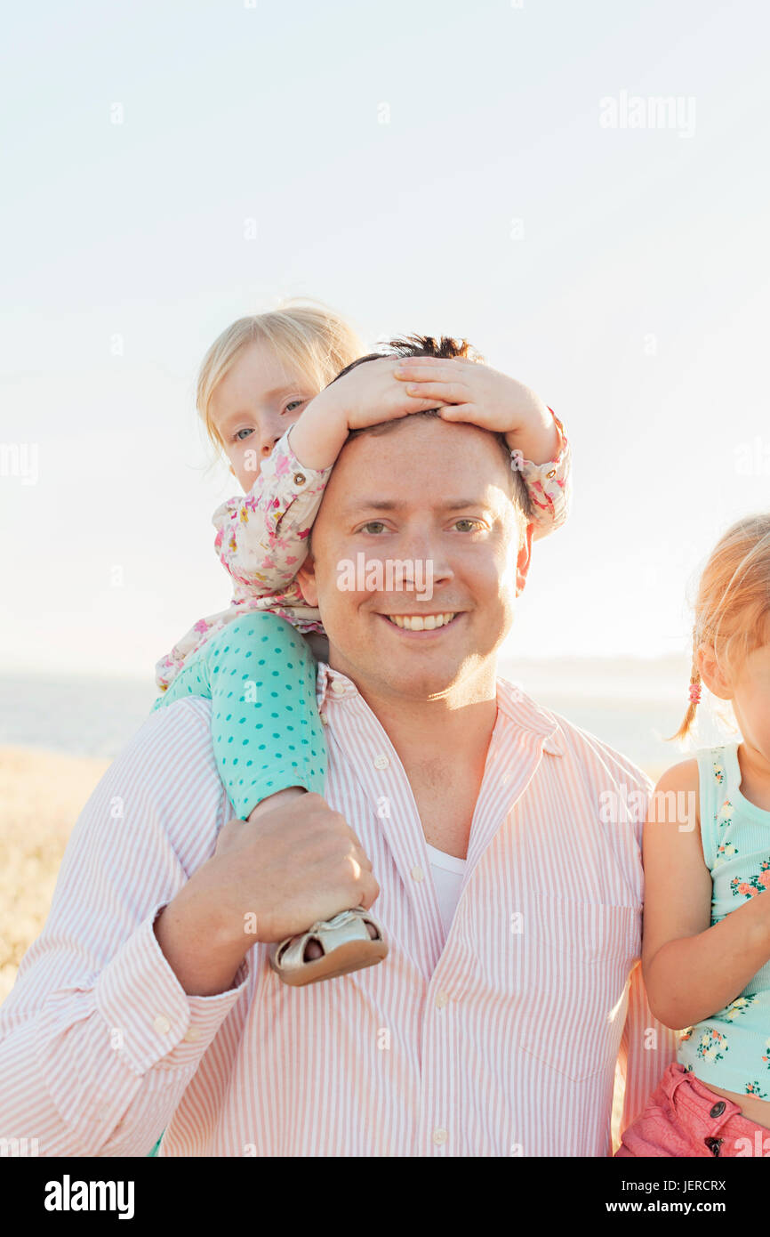 Father with daughters Stock Photo - Alamy