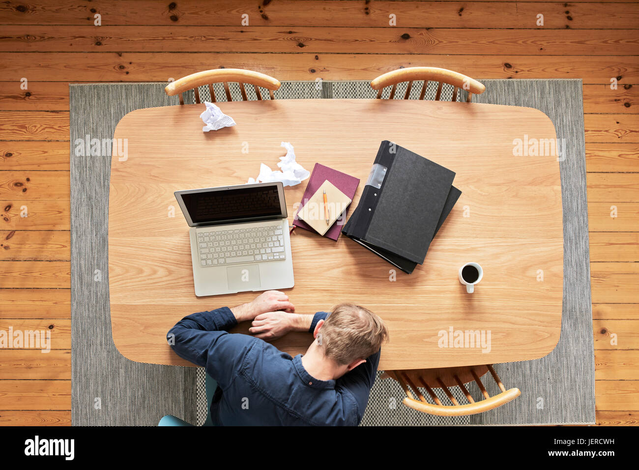 Man at desk, directly above Stock Photo - Alamy