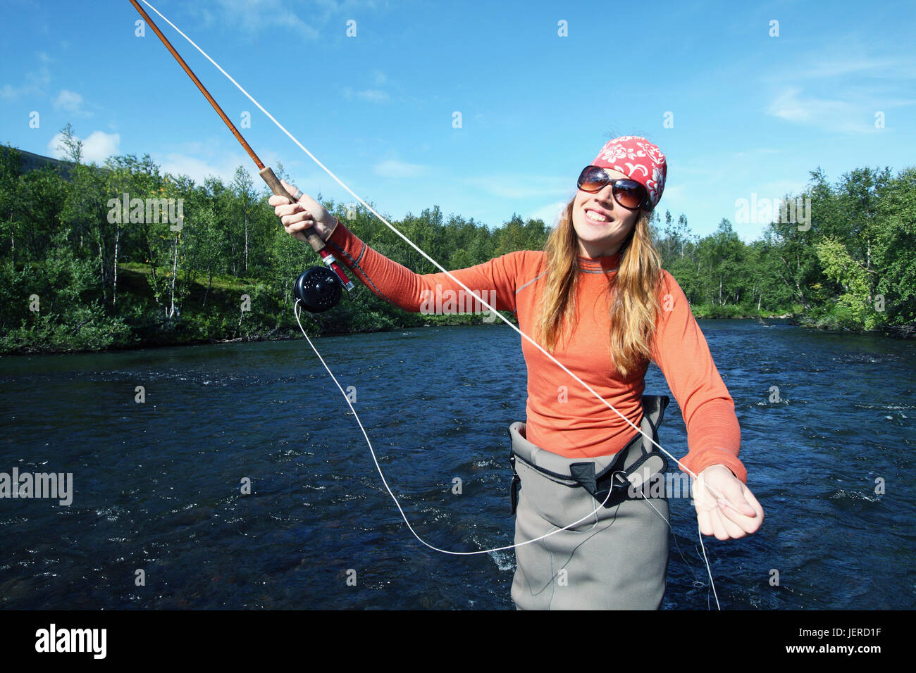 Three young women fishing hi-res stock photography and images - Alamy