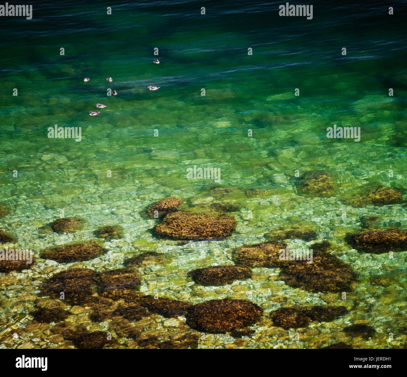 Rocks under water Stock Photo - Alamy