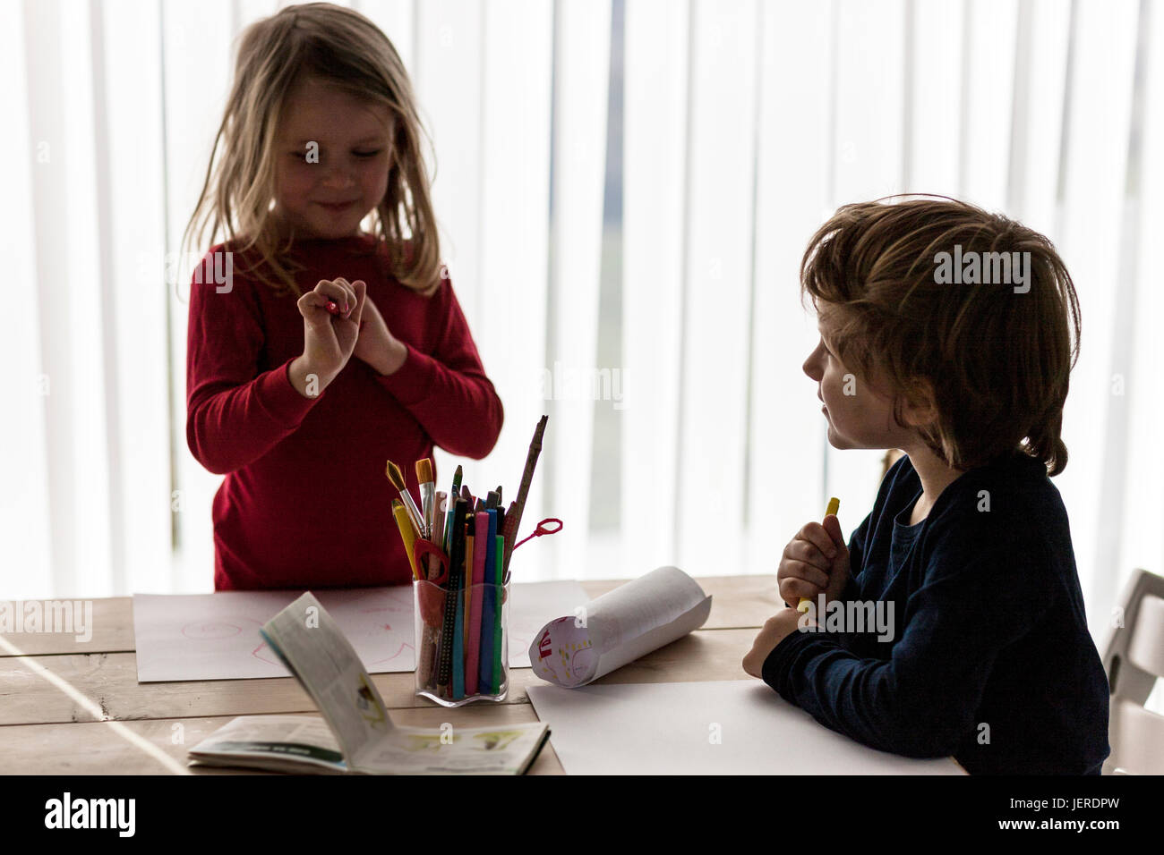 Smiling girls drawing together hi-res stock photography and images - Alamy