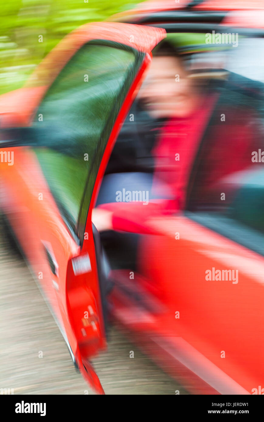 Person leaving car Stock Photo - Alamy
