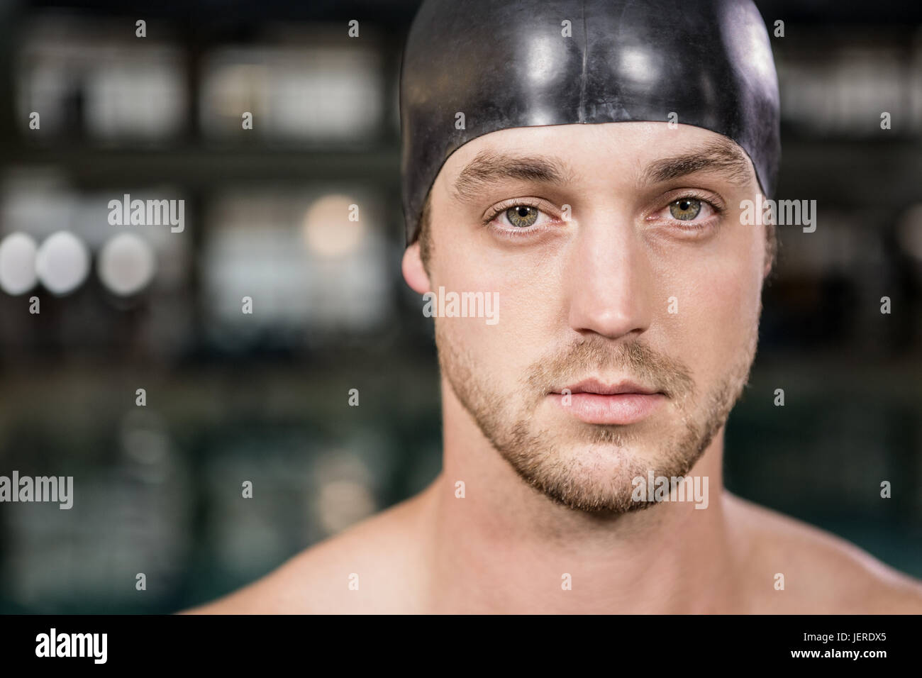 Portrait of swimmer standing by the pool Stock Photo - Alamy