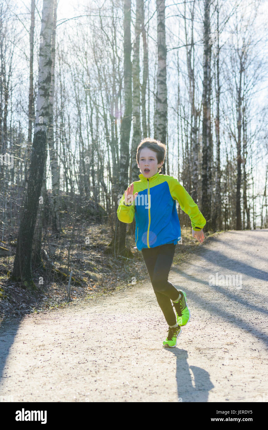 Boy running track hi-res stock photography and images - Alamy