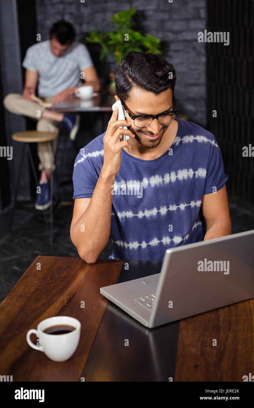 Man making a phone call Stock Photo - Alamy