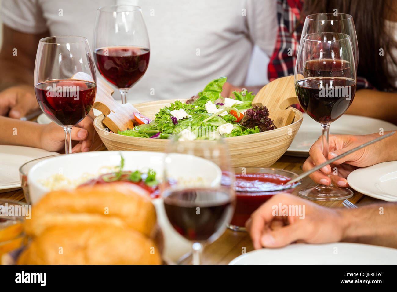 Friends having meal together Stock Photo - Alamy