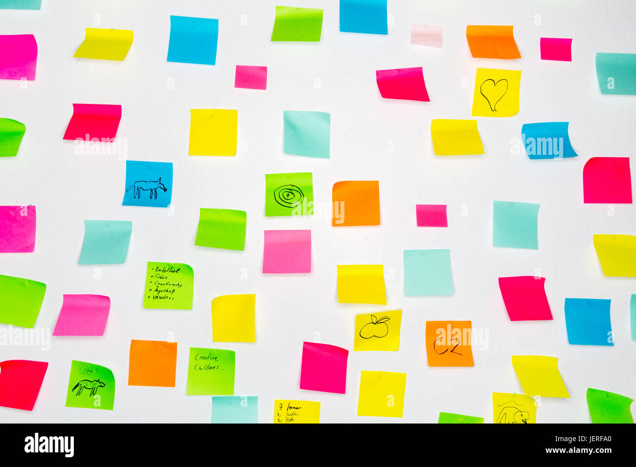 Colorful adhesive cards on white background Stock Photo - Alamy