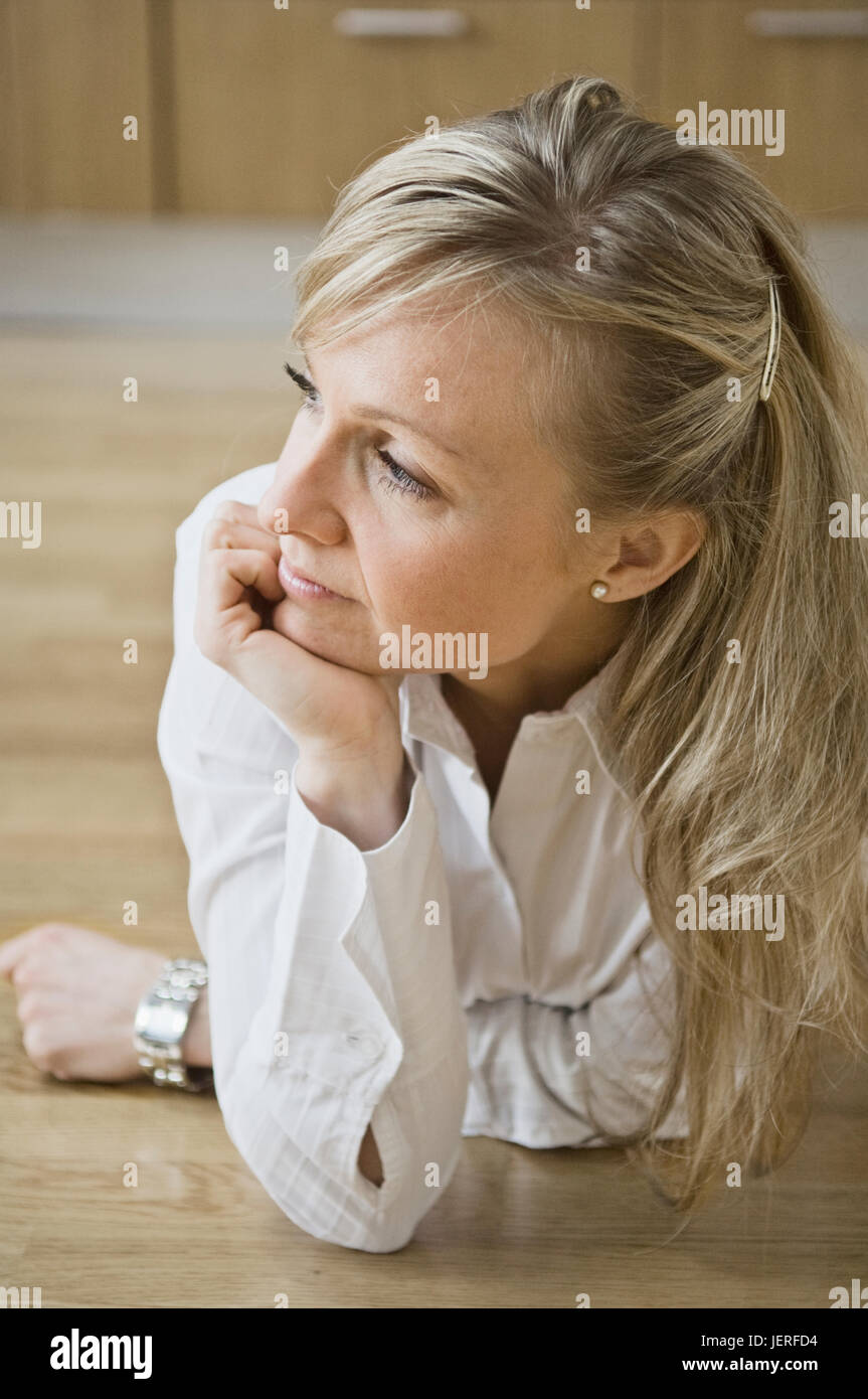 Thoughtful woman looking away Stock Photo - Alamy