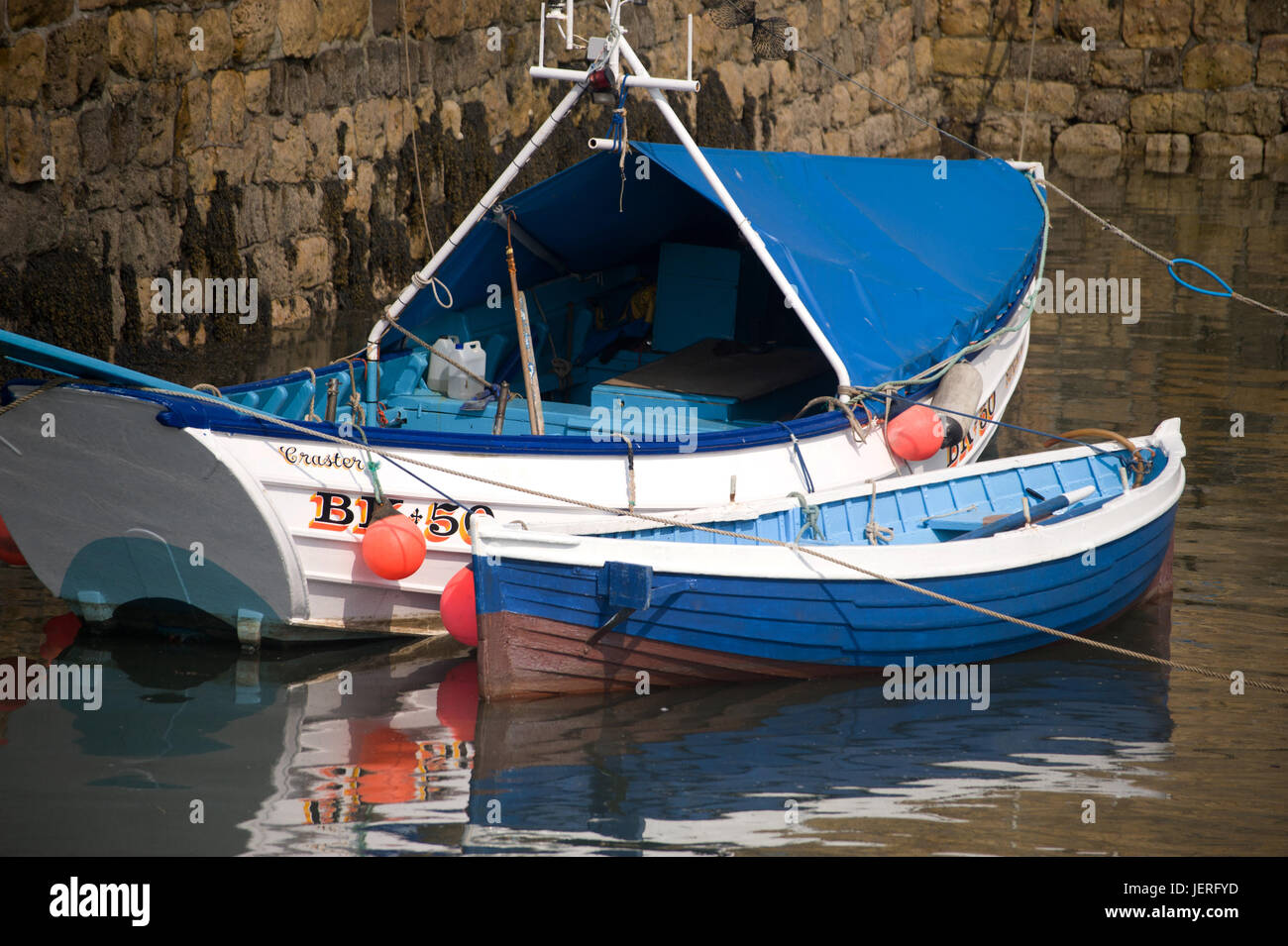 Fishning boats in Beadnell harbour, Northumberland Stock Photo - Alamy