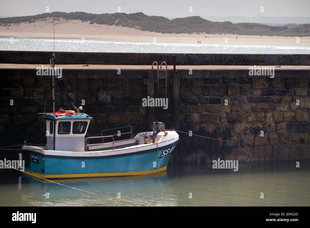 Fishning boat in Beadnell harbour, Northumberland Stock Photo - Alamy