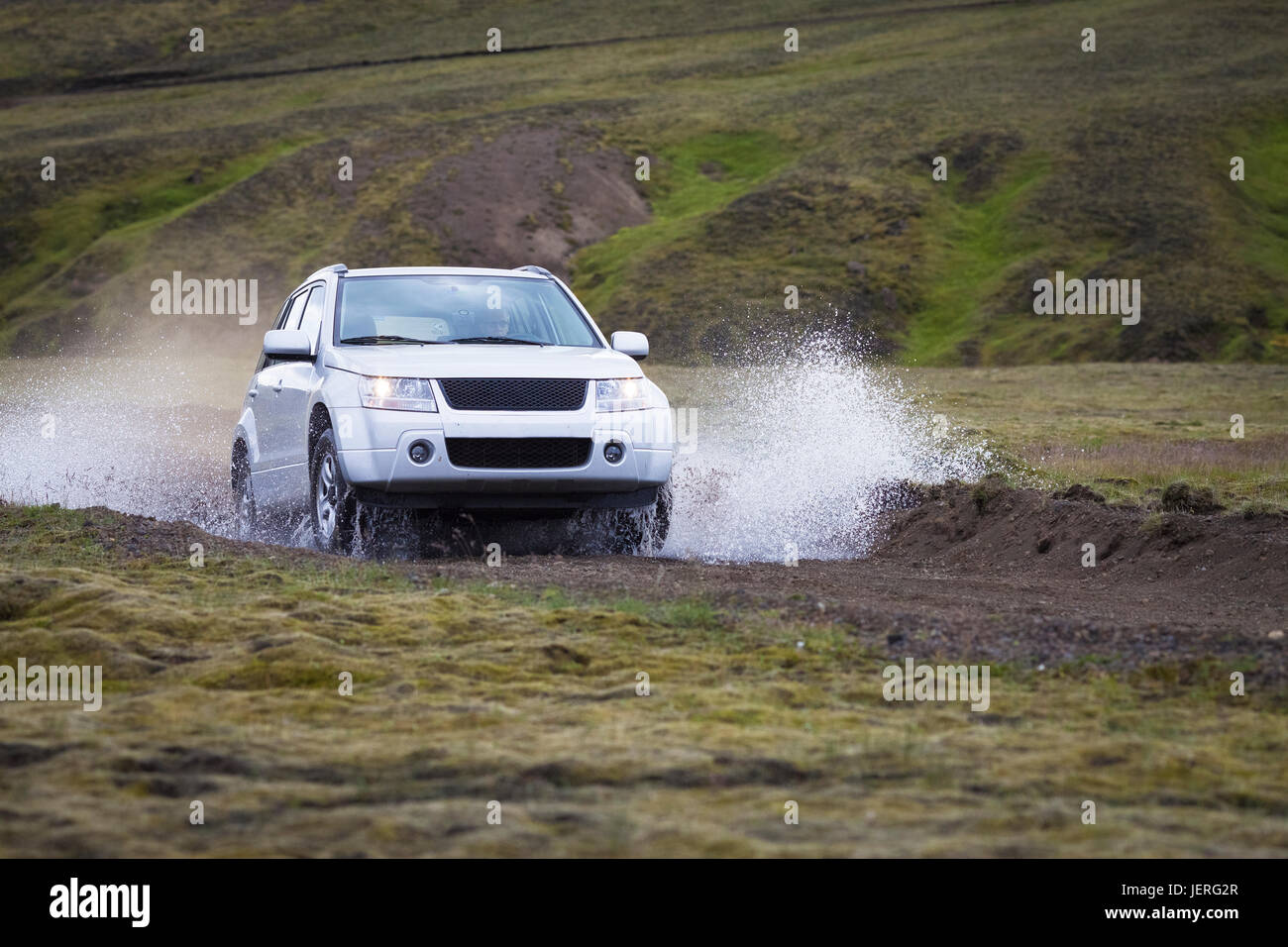 Car crossing water Stock Photo - Alamy