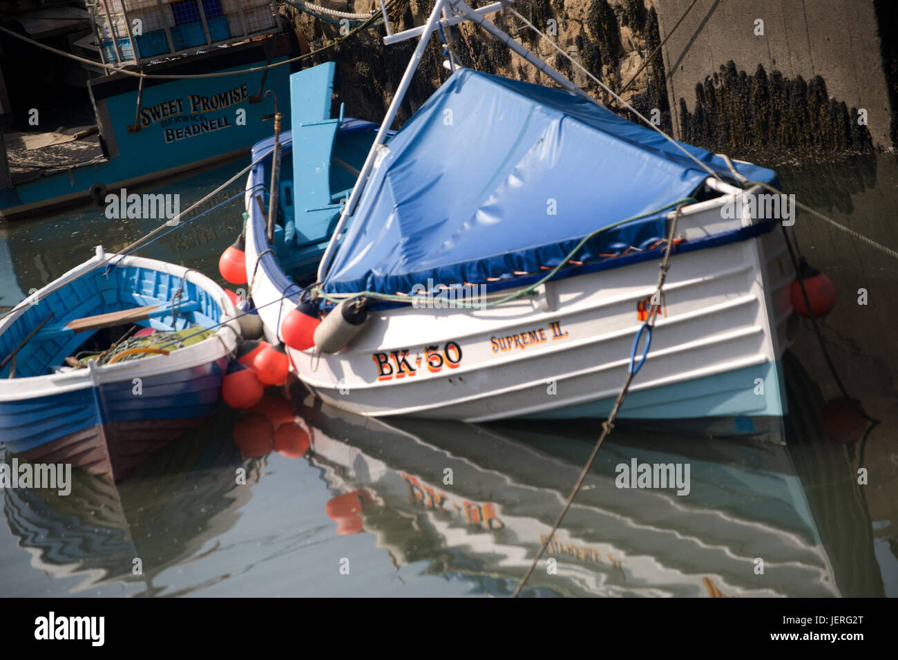 Fishning boat in Beadnell harbour, Northumberland Stock Photo - Alamy