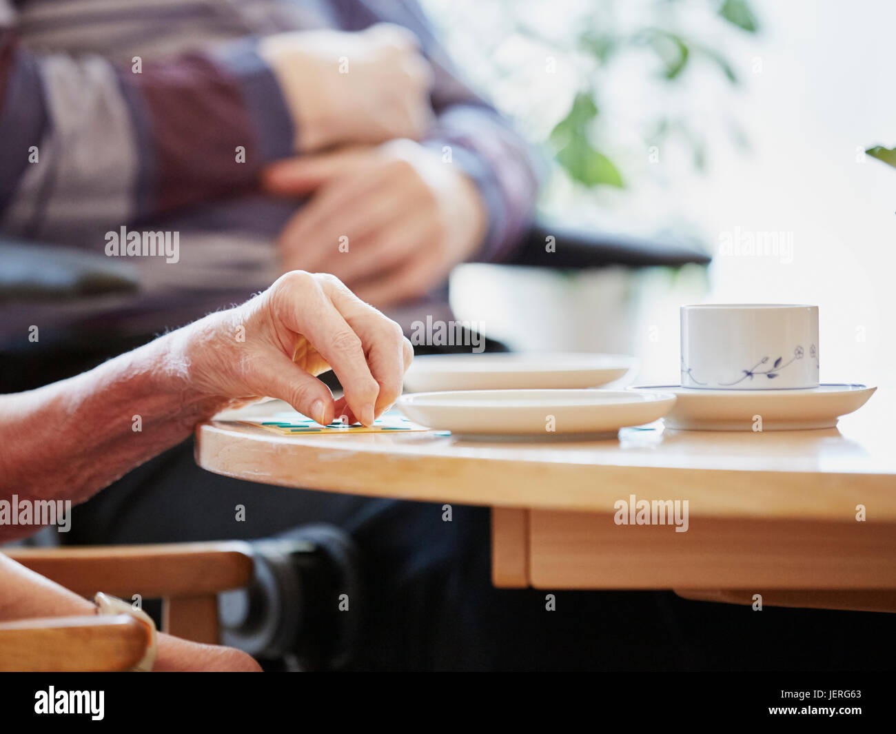 Hand senior coffee hi-res stock photography and images - Alamy