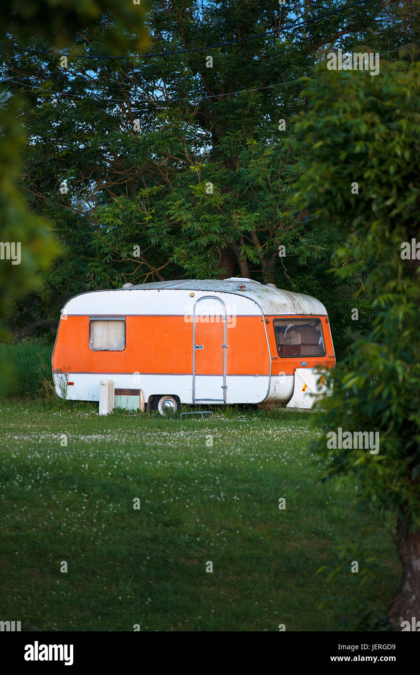 Caravan parked on meadow Stock Photo - Alamy