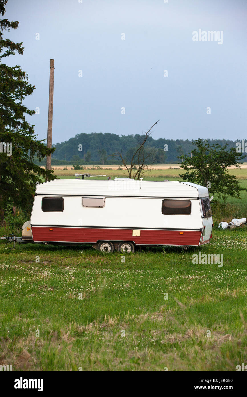 Landscape with parked caravan Stock Photo - Alamy