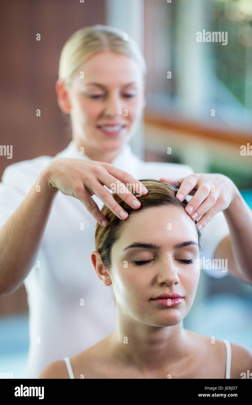 Woman receiving a head massage Stock Photo - Alamy