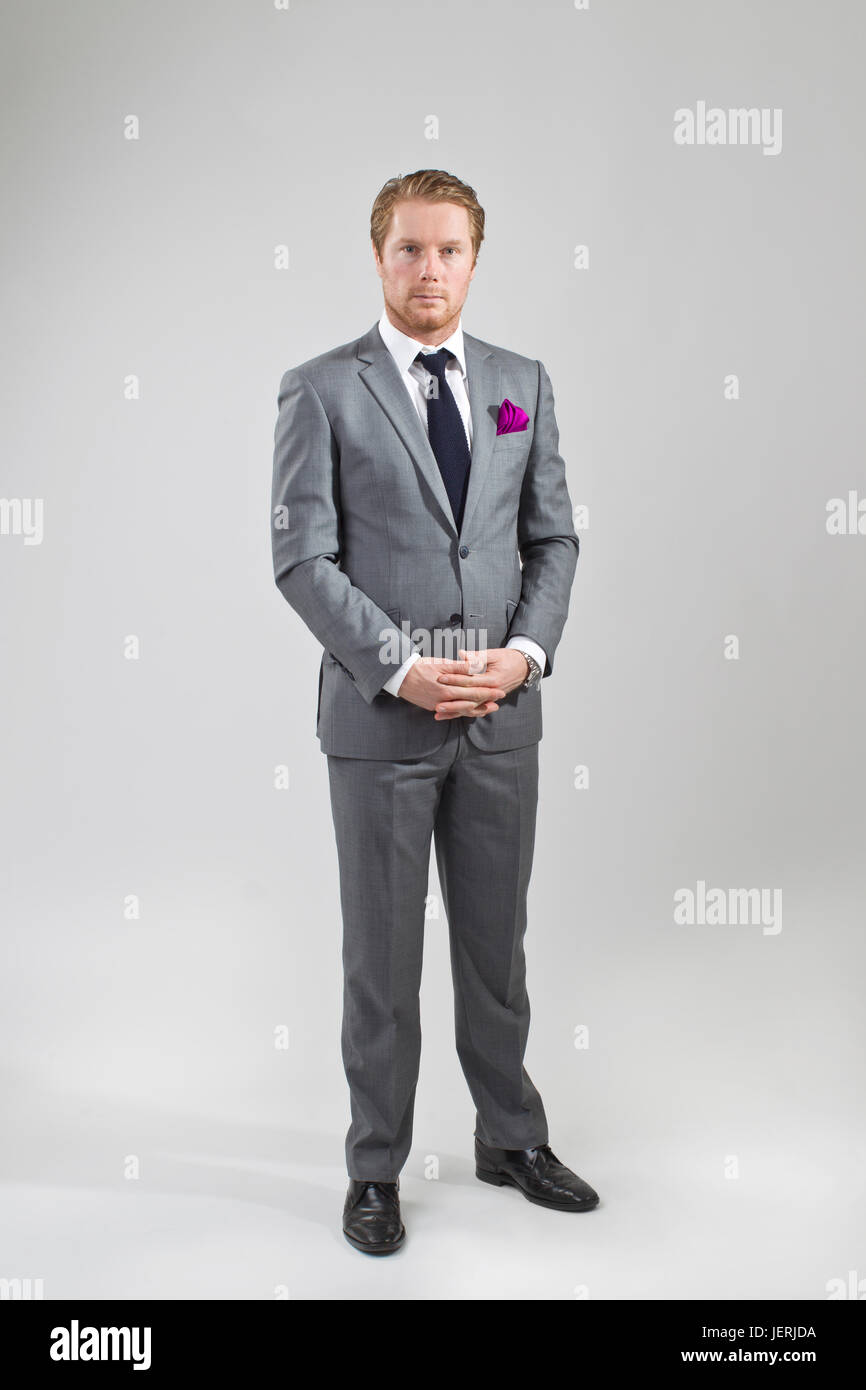 Man wearing suit, studio shot Stock Photo - Alamy
