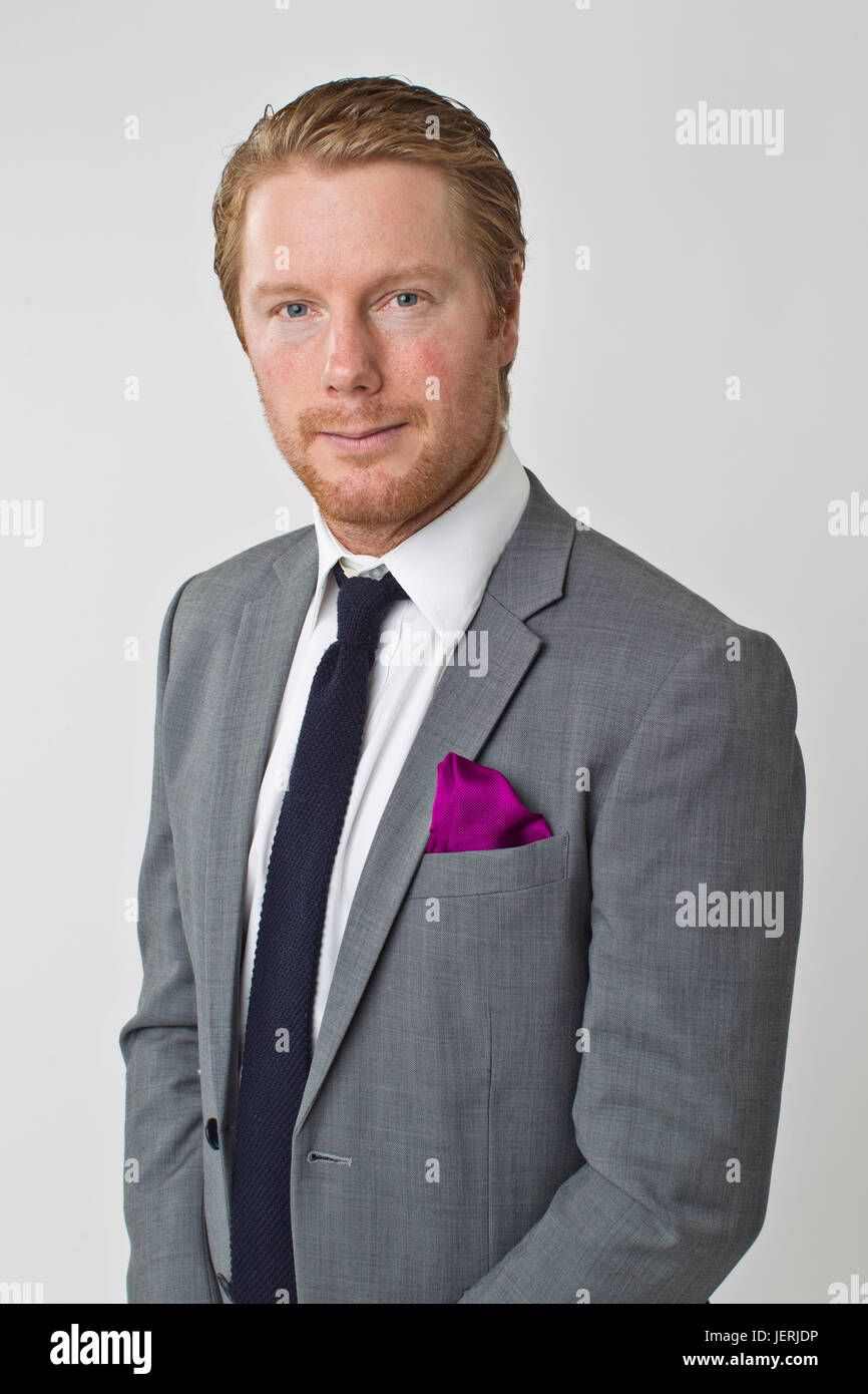 Portrait of man wearing suit, studio shot Stock Photo - Alamy