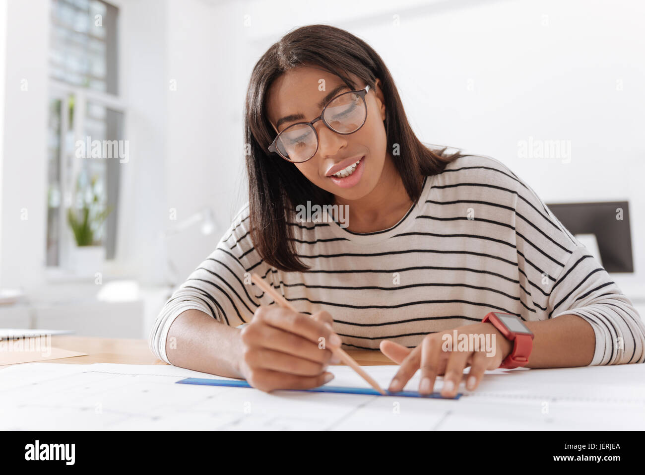 Intelligent smart woman drawing Stock Photo - Alamy