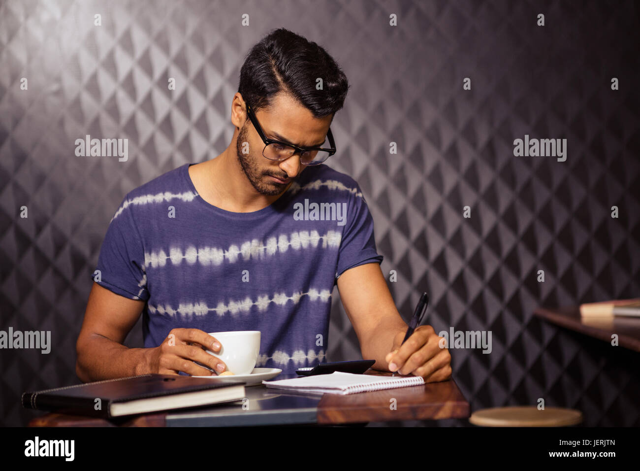 Man taking notes Stock Photo - Alamy