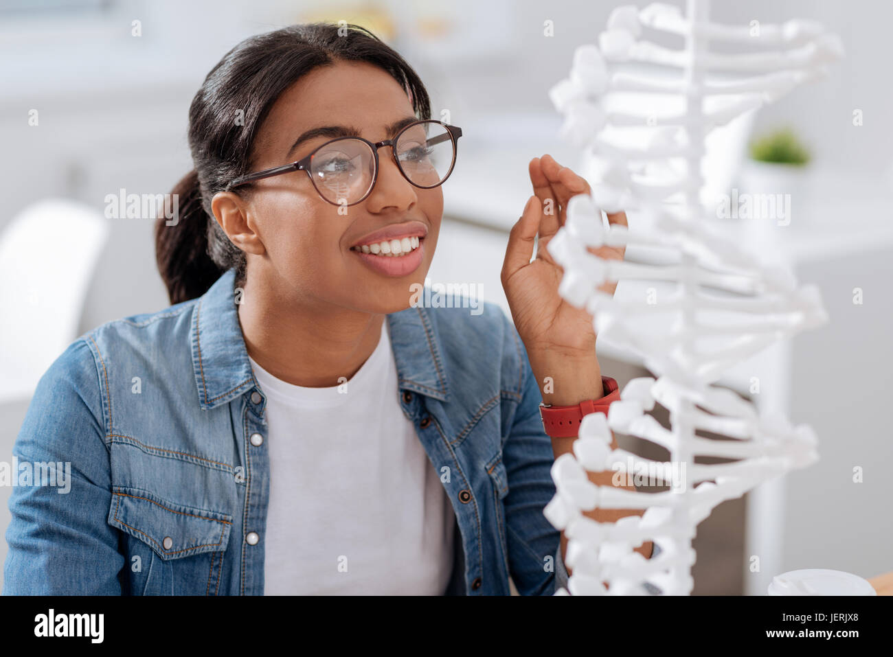 Smart young student studying biology Stock Photo - Alamy