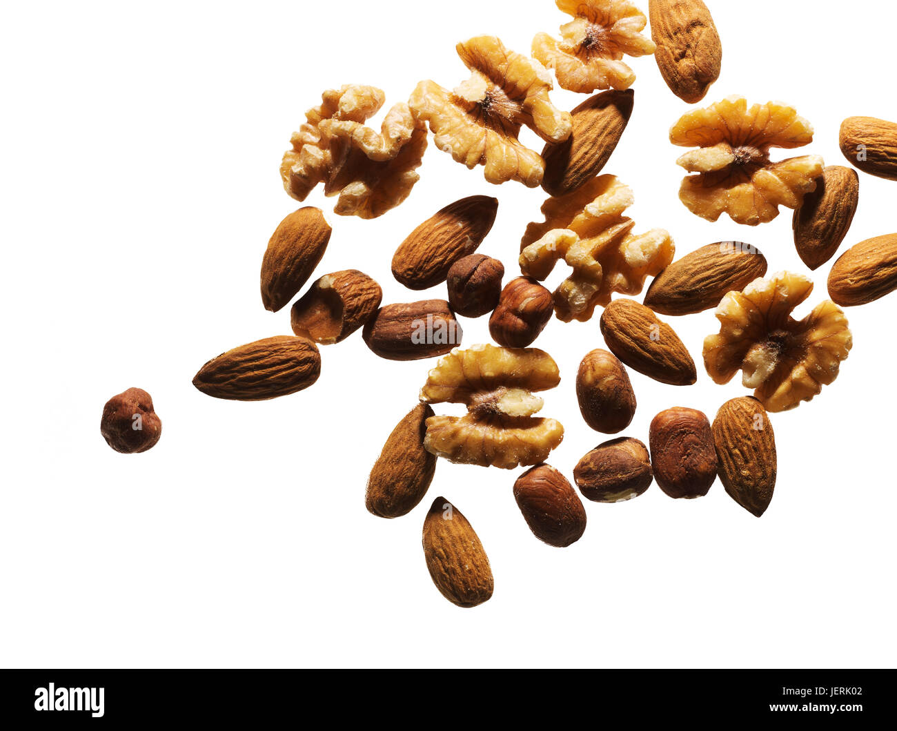 Nuts on white background Stock Photo - Alamy