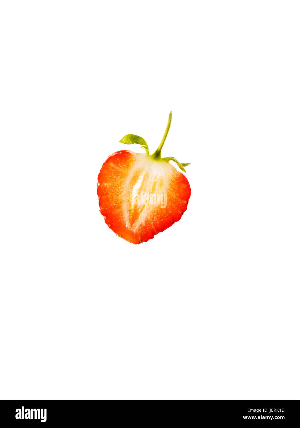 Half of strawberry on white background Stock Photo - Alamy