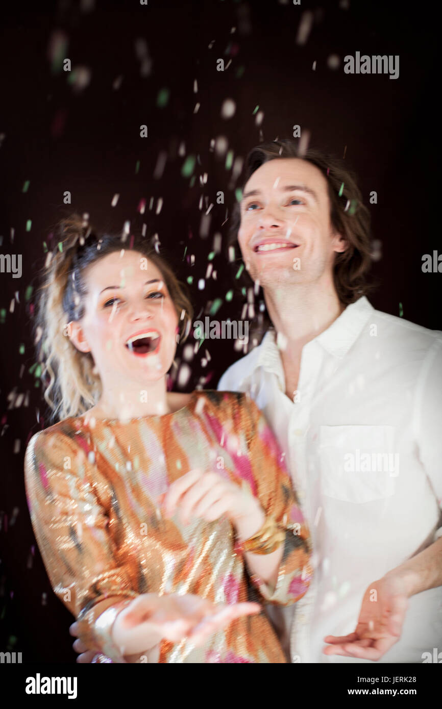 Confetti throw black background hi-res stock photography and images - Alamy