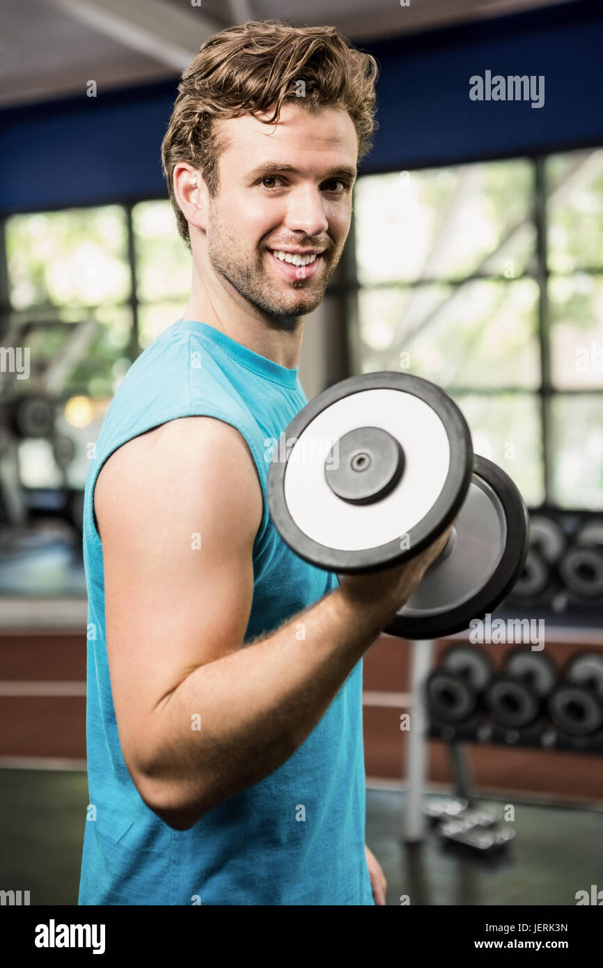Man working out with dumbbell Stock Photo - Alamy