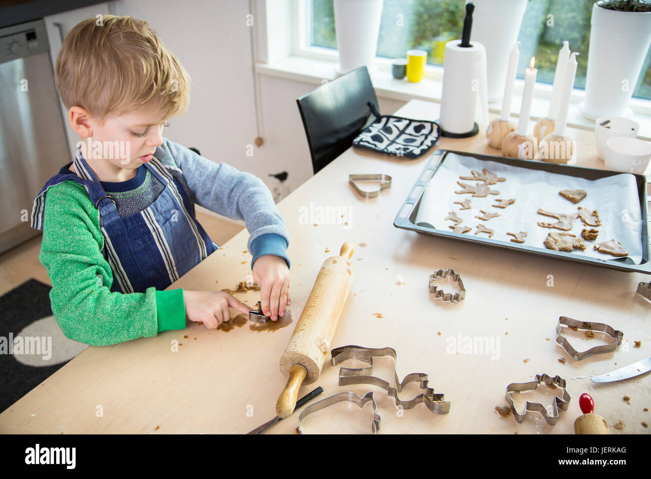 Boy making cookies hi-res stock photography and images - Alamy