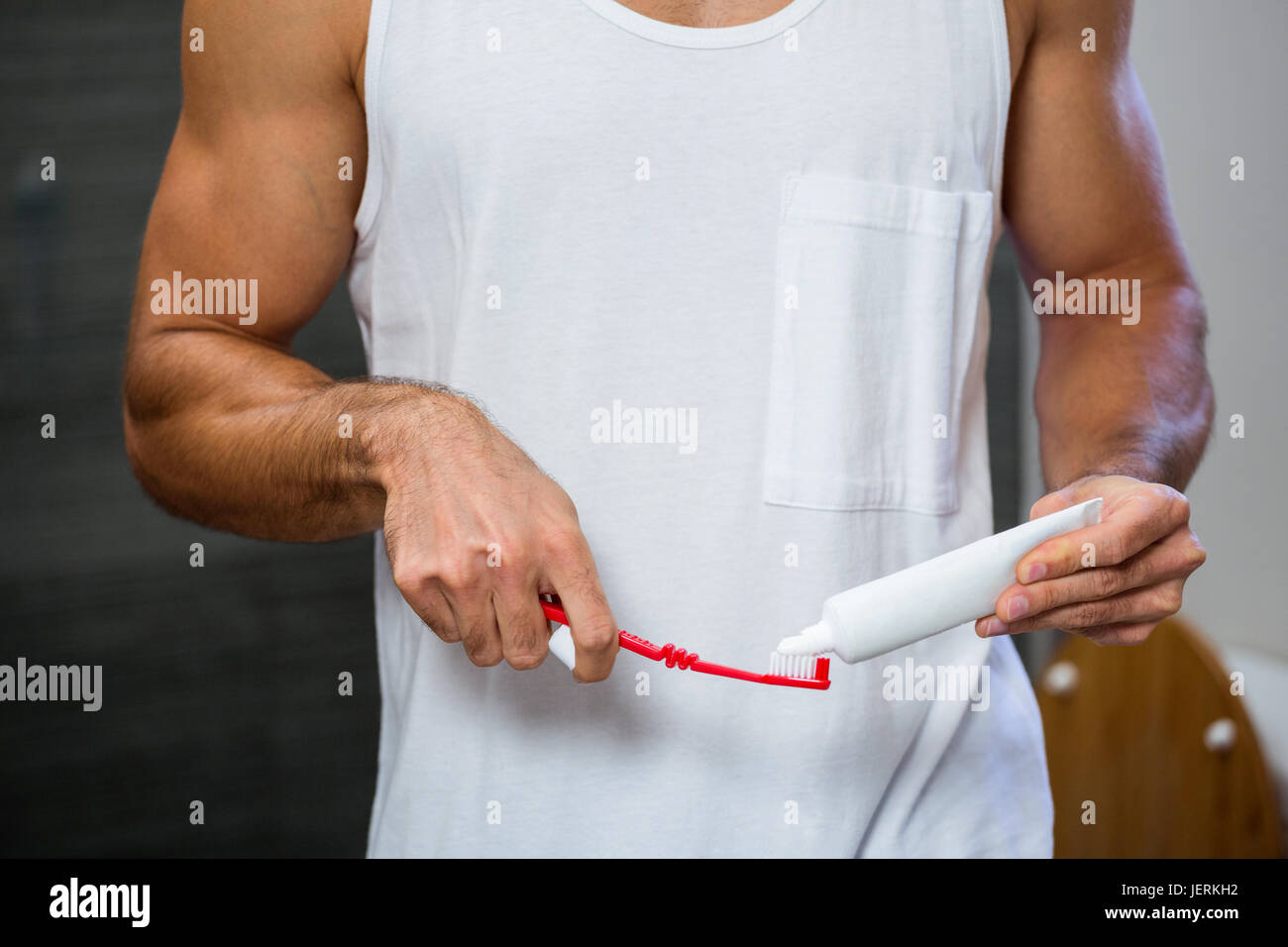 Squeezing toothpaste hi-res stock photography and images - Alamy