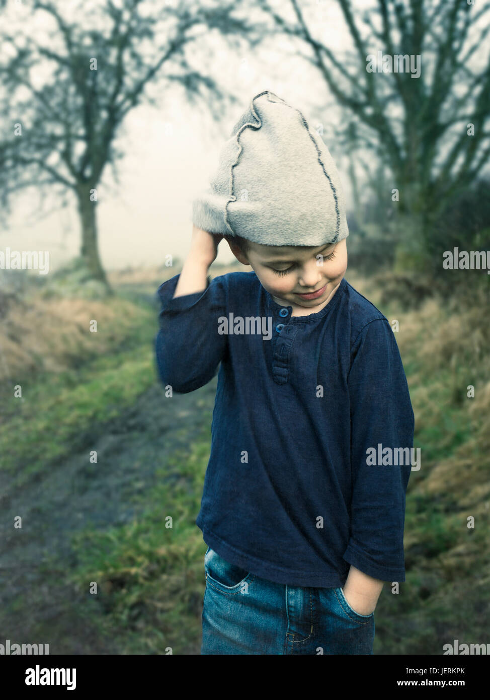 Boy wearing hat Stock Photo - Alamy