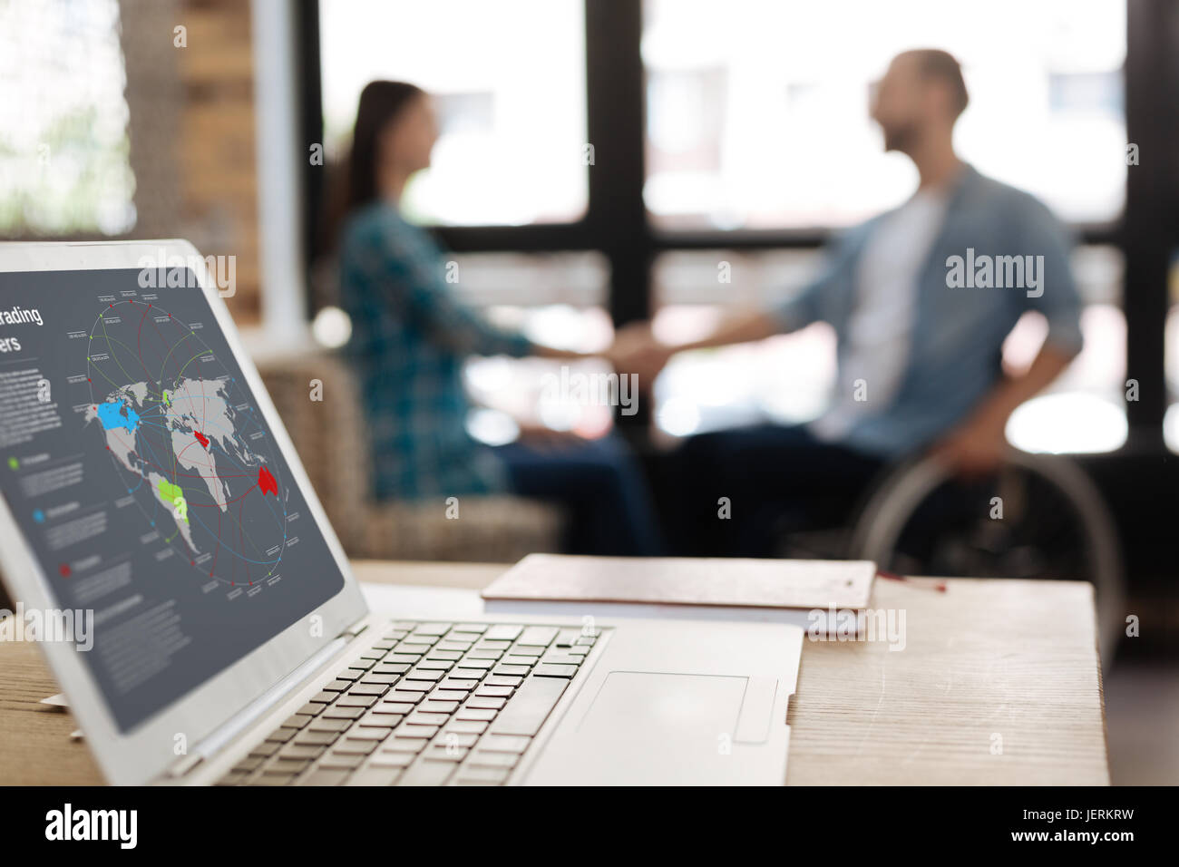 Devoted productive people reaching an agreement Stock Photo - Alamy