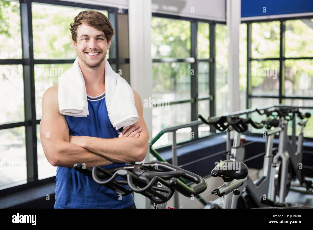 Handsome man standing in gym Stock Photo - Alamy