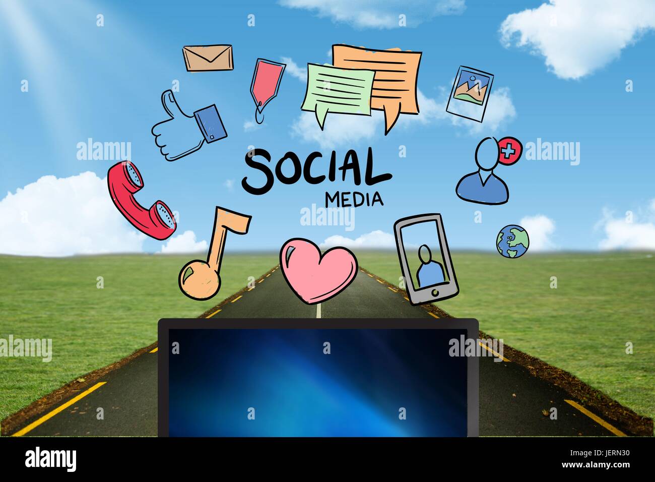 Laptop with social media icons Stock Photo - Alamy