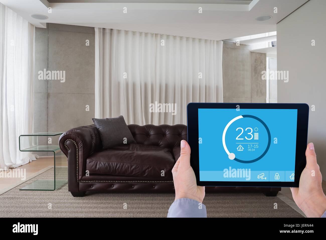 Tablet measuring temperature Stock Photo - Alamy