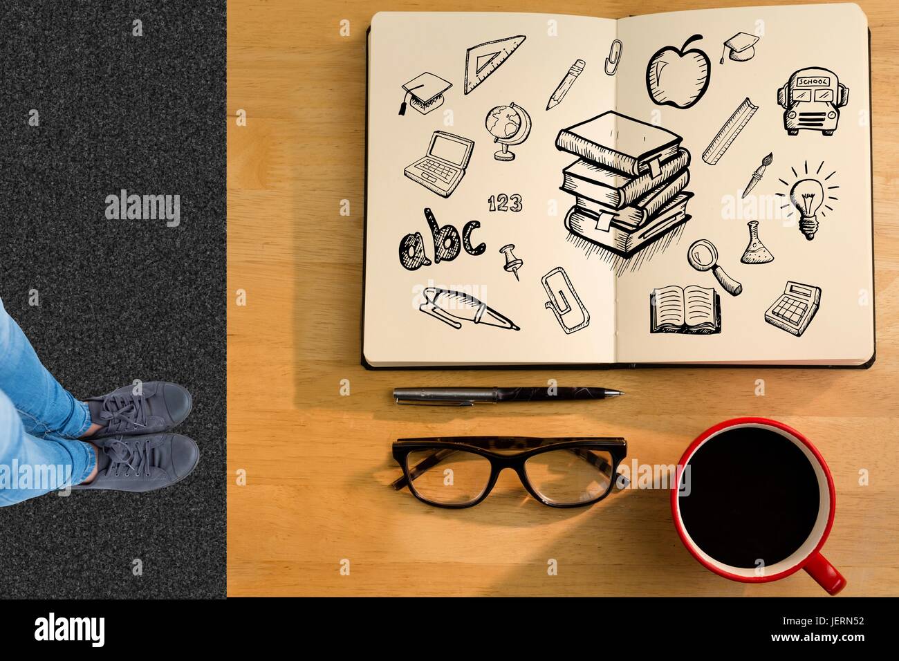 Overhead of students desk with notepad Stock Photo - Alamy