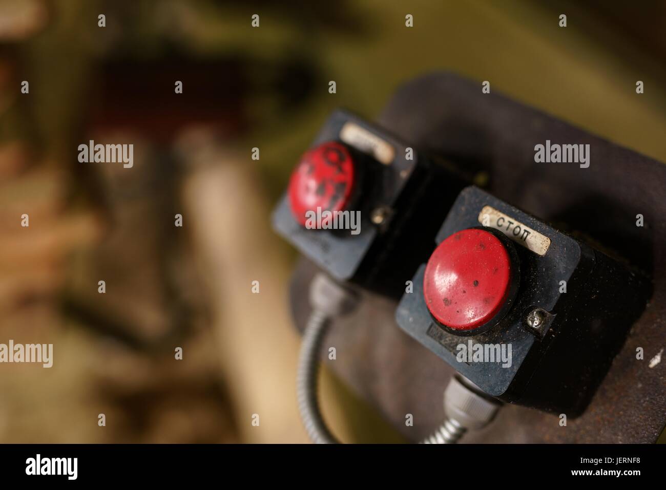 Machine control panel with two red buttons Stock Photo - Alamy