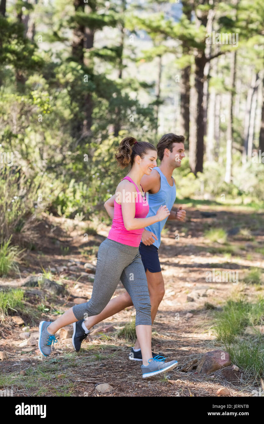 Young healthy couple running Stock Photo - Alamy