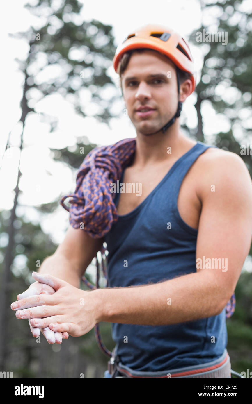Portrait of man wearing helmet at forest Stock Photo - Alamy