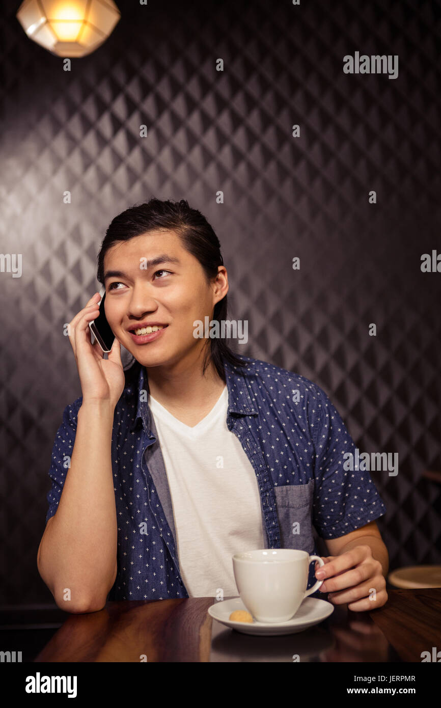 Man making a phone call Stock Photo - Alamy